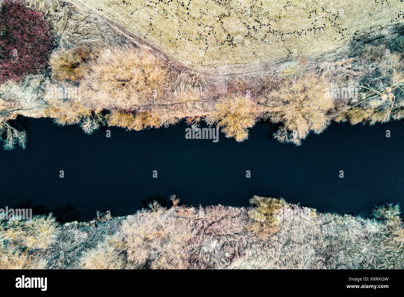 Aerial photo small river by field, meadows and wood of the bird's-eye ...