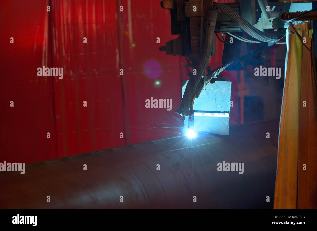 Welder machine performs welding large diameter pipe Stock Photo - Alamy