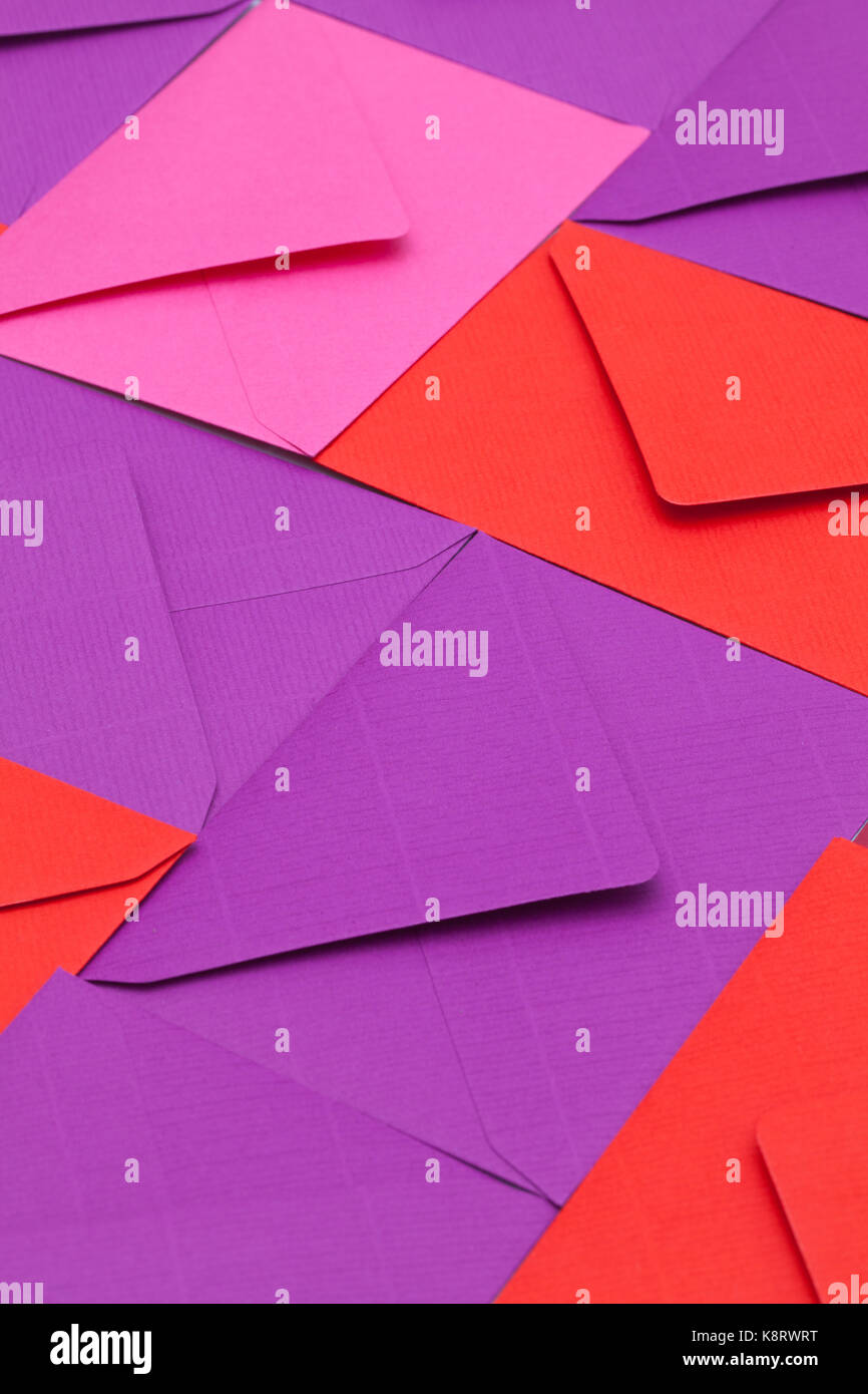 Different colored envelopes on the table Stock Photo - Alamy