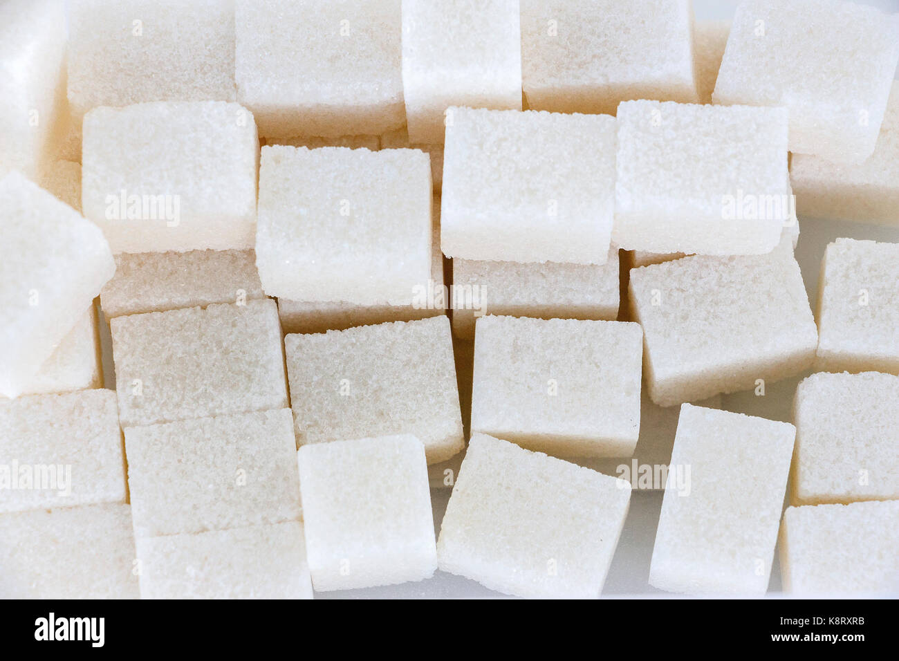 White sugar lumps Stock Photo - Alamy