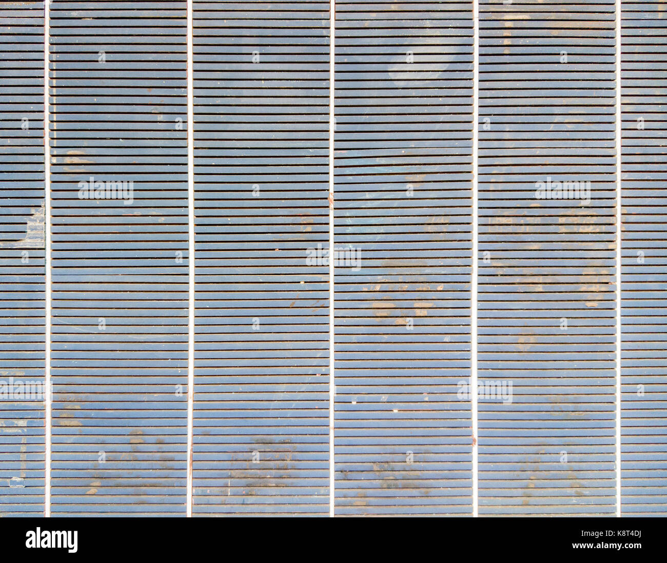 Old metal grate of the empty time table board of the train station ...
