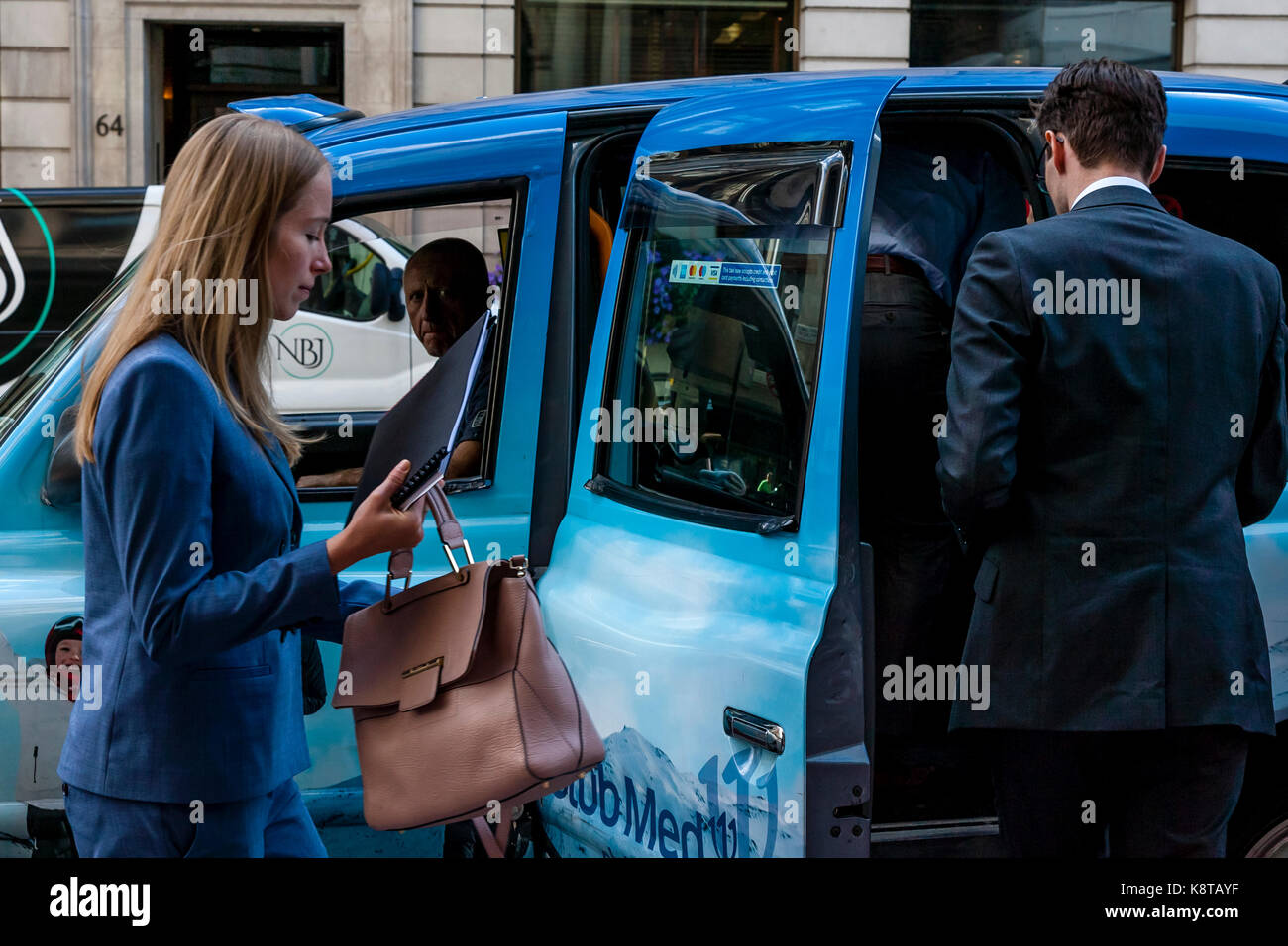 Getting into a cab hi-res stock photography and images - Alamy