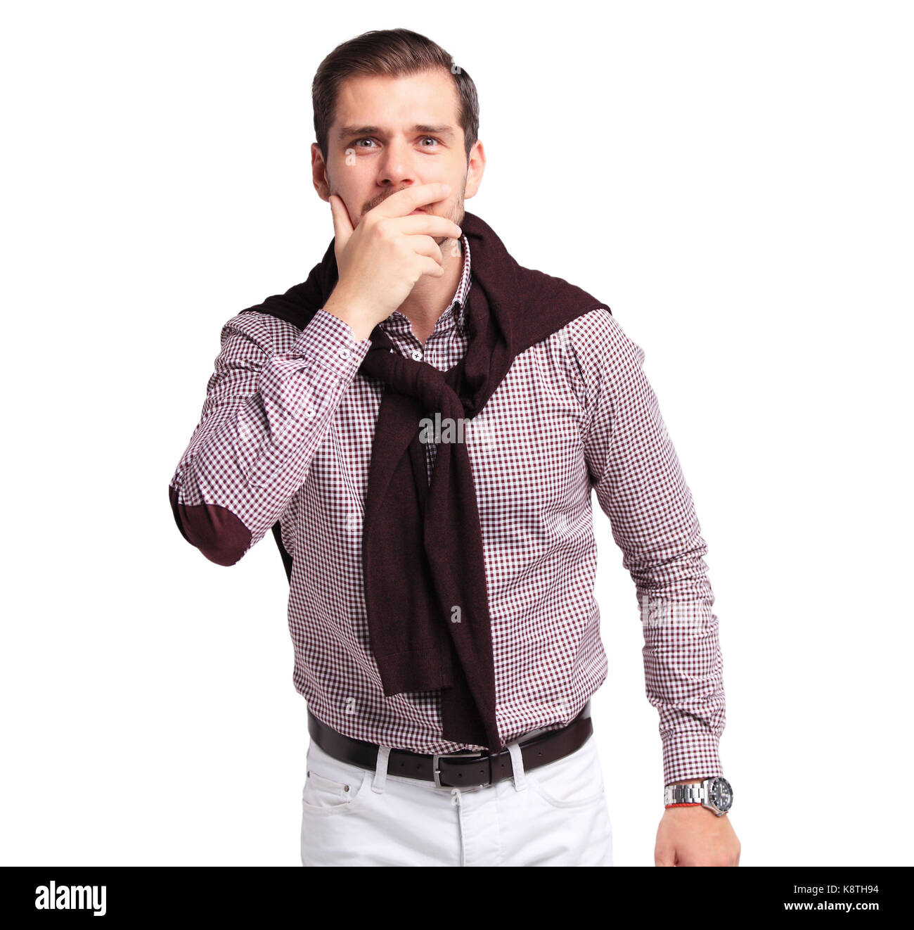 Portrait of young man with shocked facial expression, isolated over ...