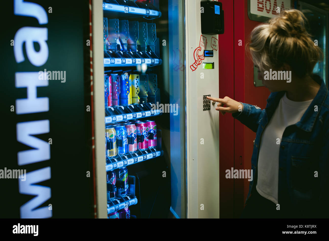 Girl Standing Vending Machine In High Resolution Stock Photography and ...