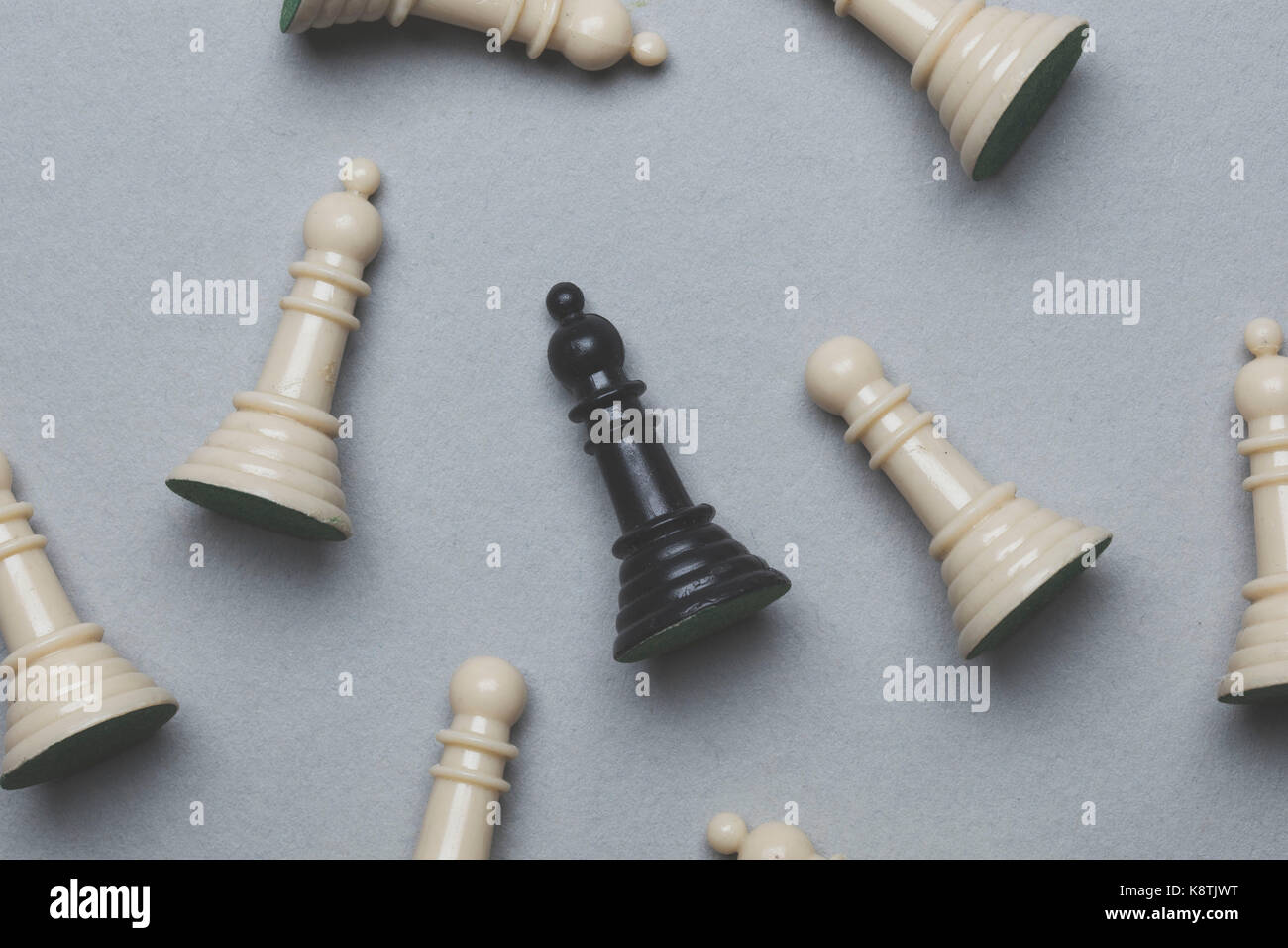 Chess game pieces on a grey background. Strategy concept Stock Photo ...