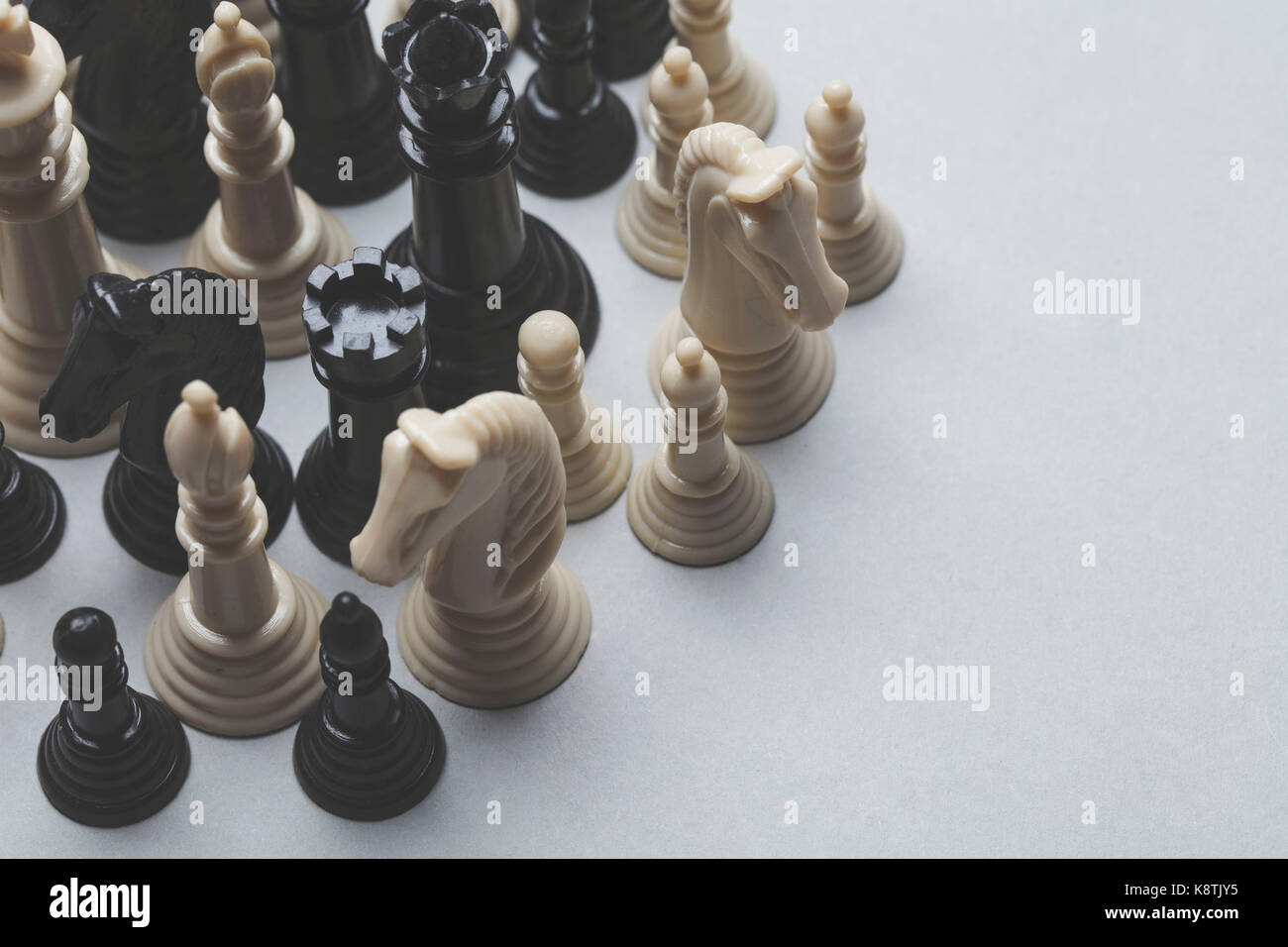 Chess game pieces on a grey background. Strategy concept Stock Photo ...