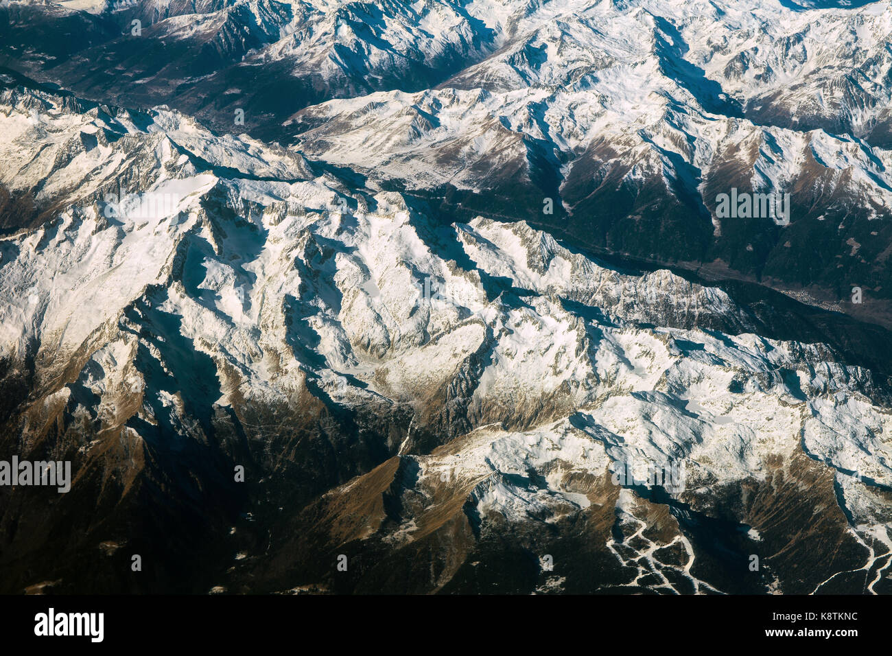 Aerial view of alps mountains covered with snow. Bird Eye View Stock ...