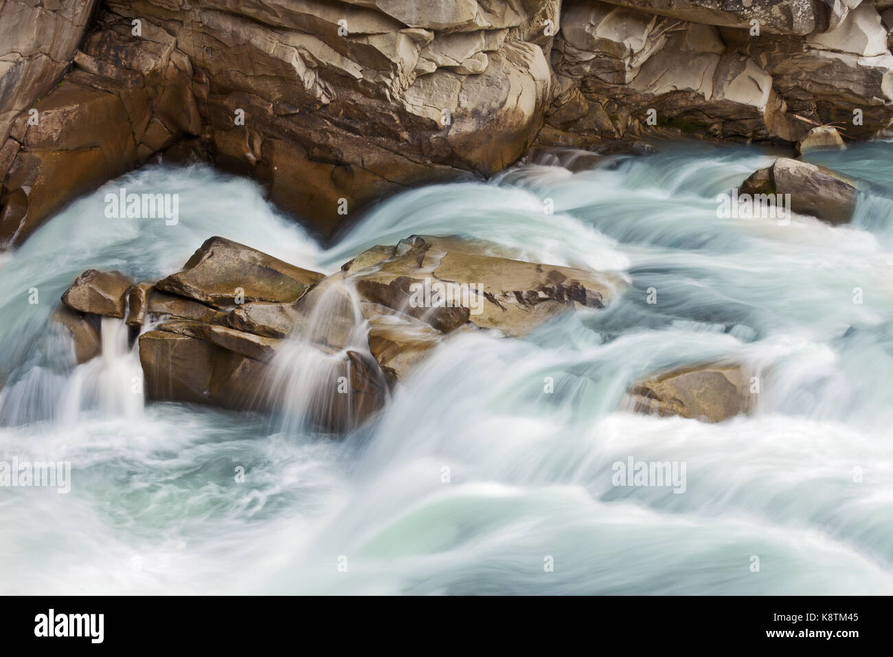 Water cascades on a mountain river Stock Photo - Alamy