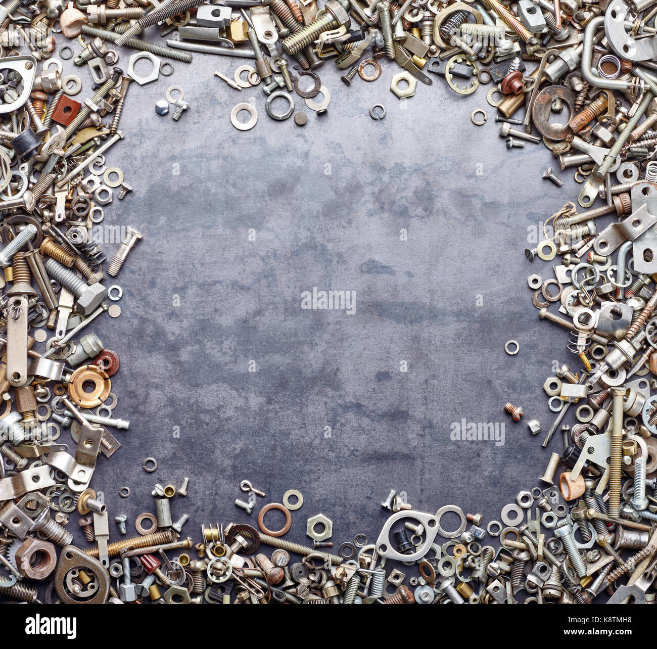 Assorted screw nuts and bolts frame on metal texture background Stock ...