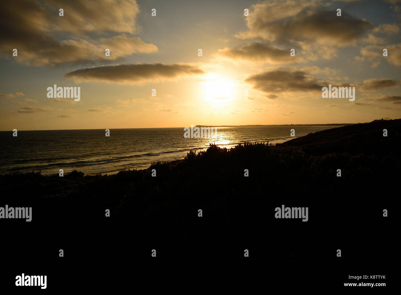 Beautiful sunset over the ocean in Australia Stock Photo - Alamy
