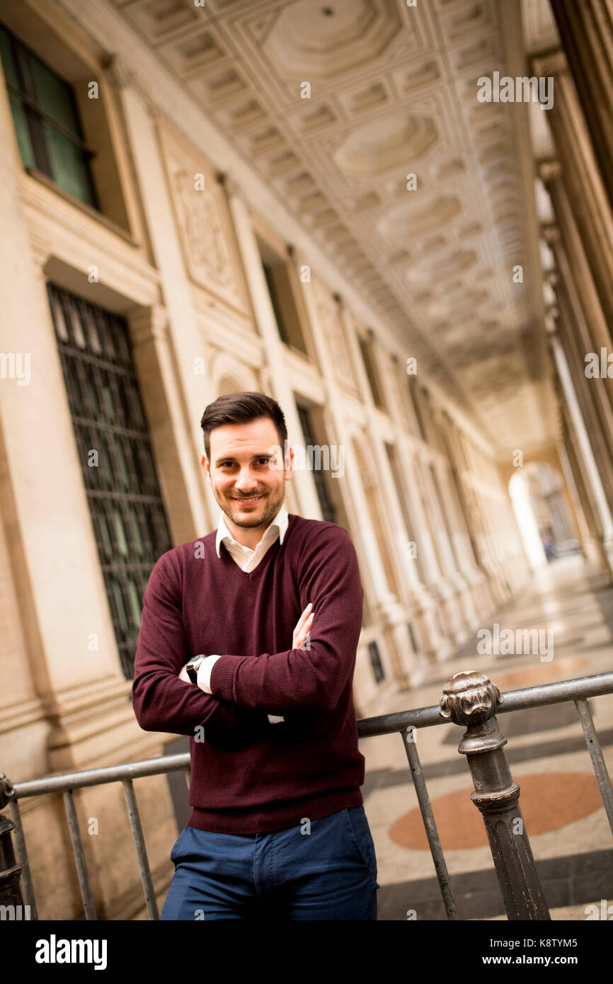 Handsome young man standing outdoor and waiting someone Stock Photo - Alamy