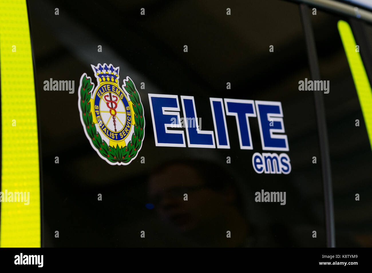 An Elite EMS (Elite Emergency Medical Services) car logo on display ...