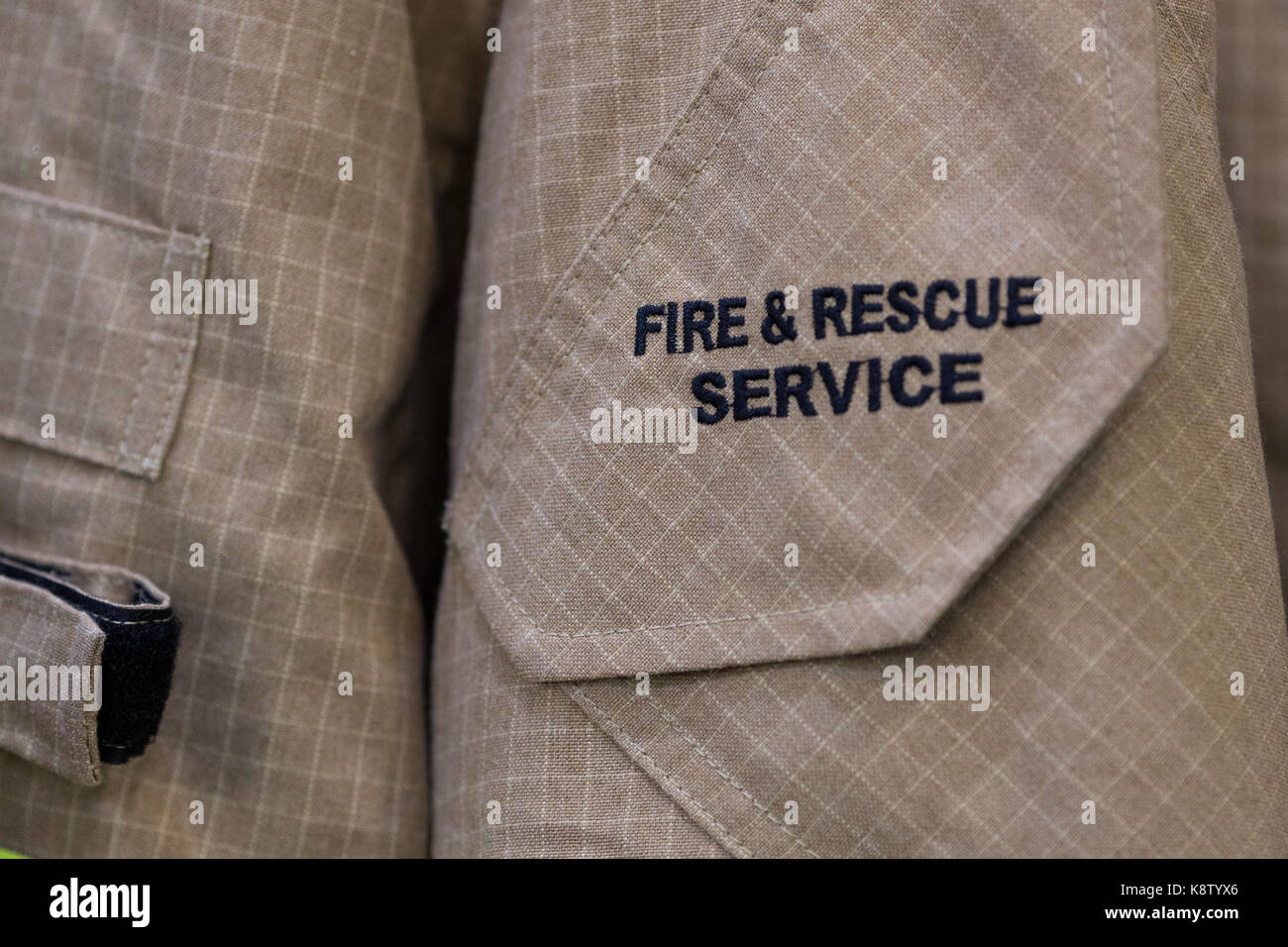 A Fire and Rescue Service badge on display during the Emergency ...