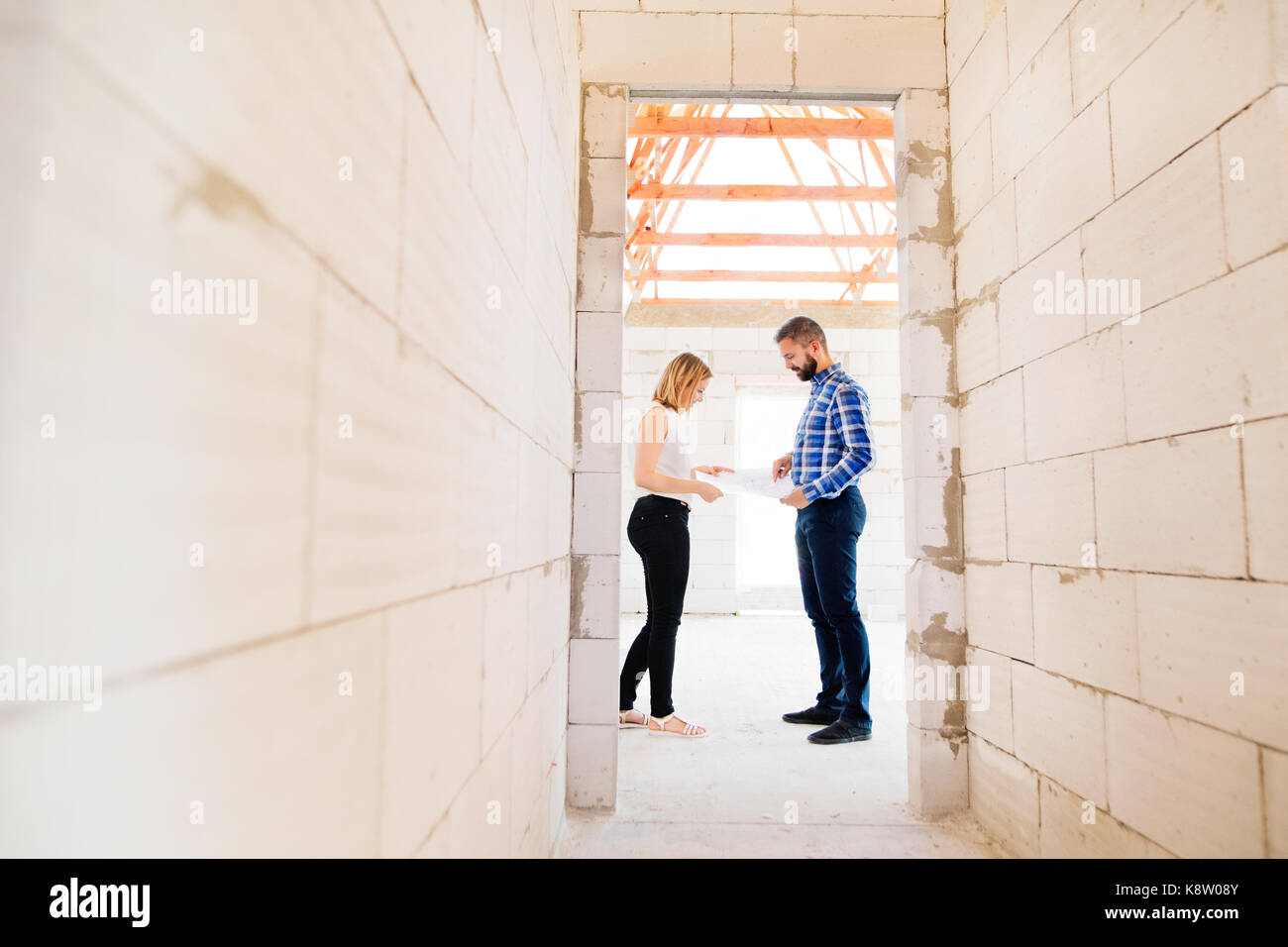 Architects and civil engineer at the construction site Stock Photo - Alamy