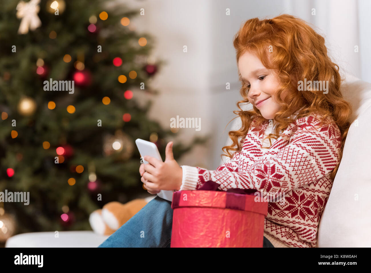 child using smartphone at home Stock Photo - Alamy