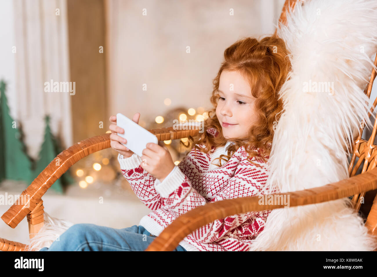 child using smartphone at home Stock Photo - Alamy