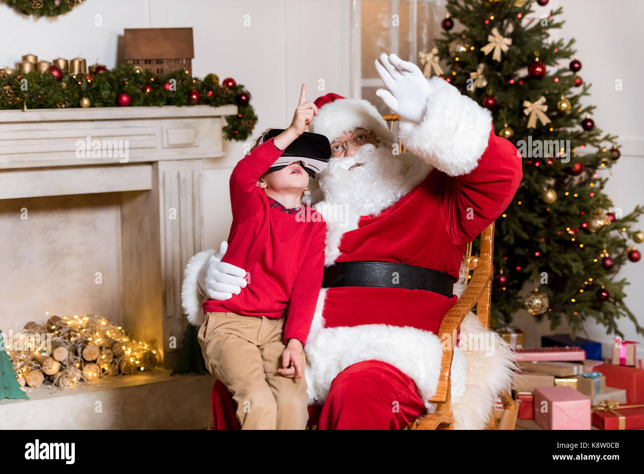 santa claus and kid in vr headset Stock Photo - Alamy