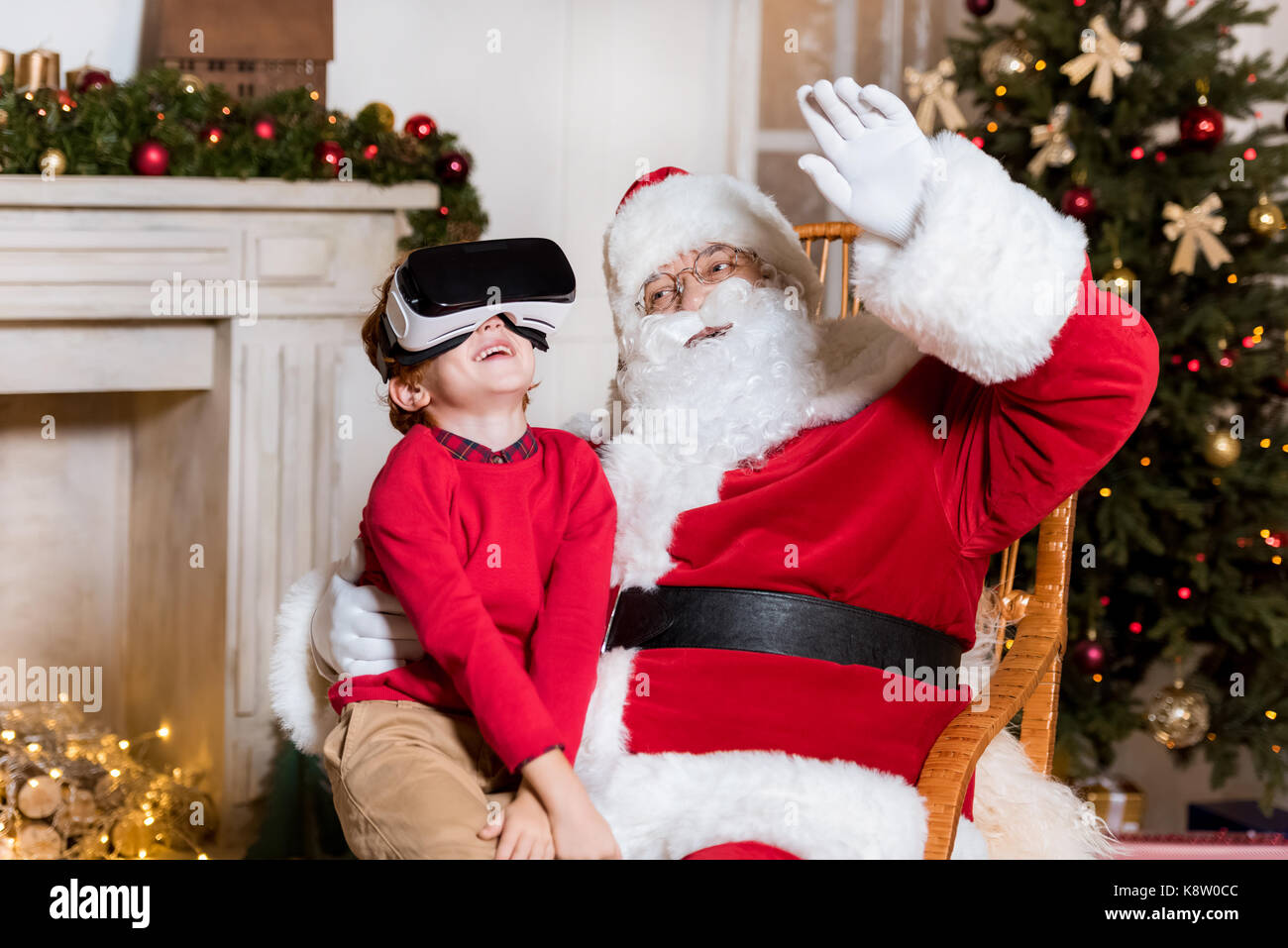 santa claus and kid in vr headset Stock Photo - Alamy