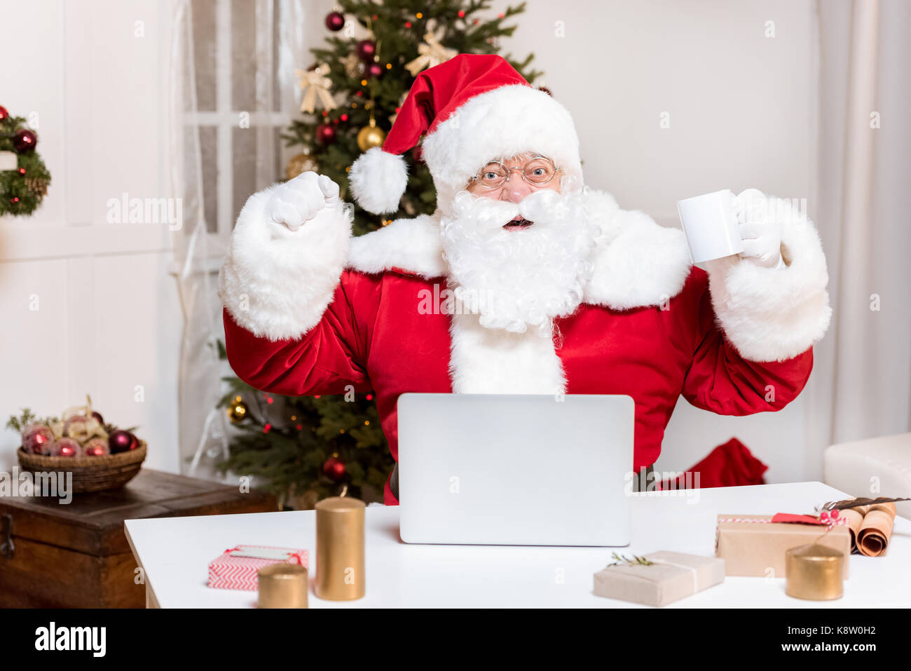Excited santa claus home hi-res stock photography and images - Alamy