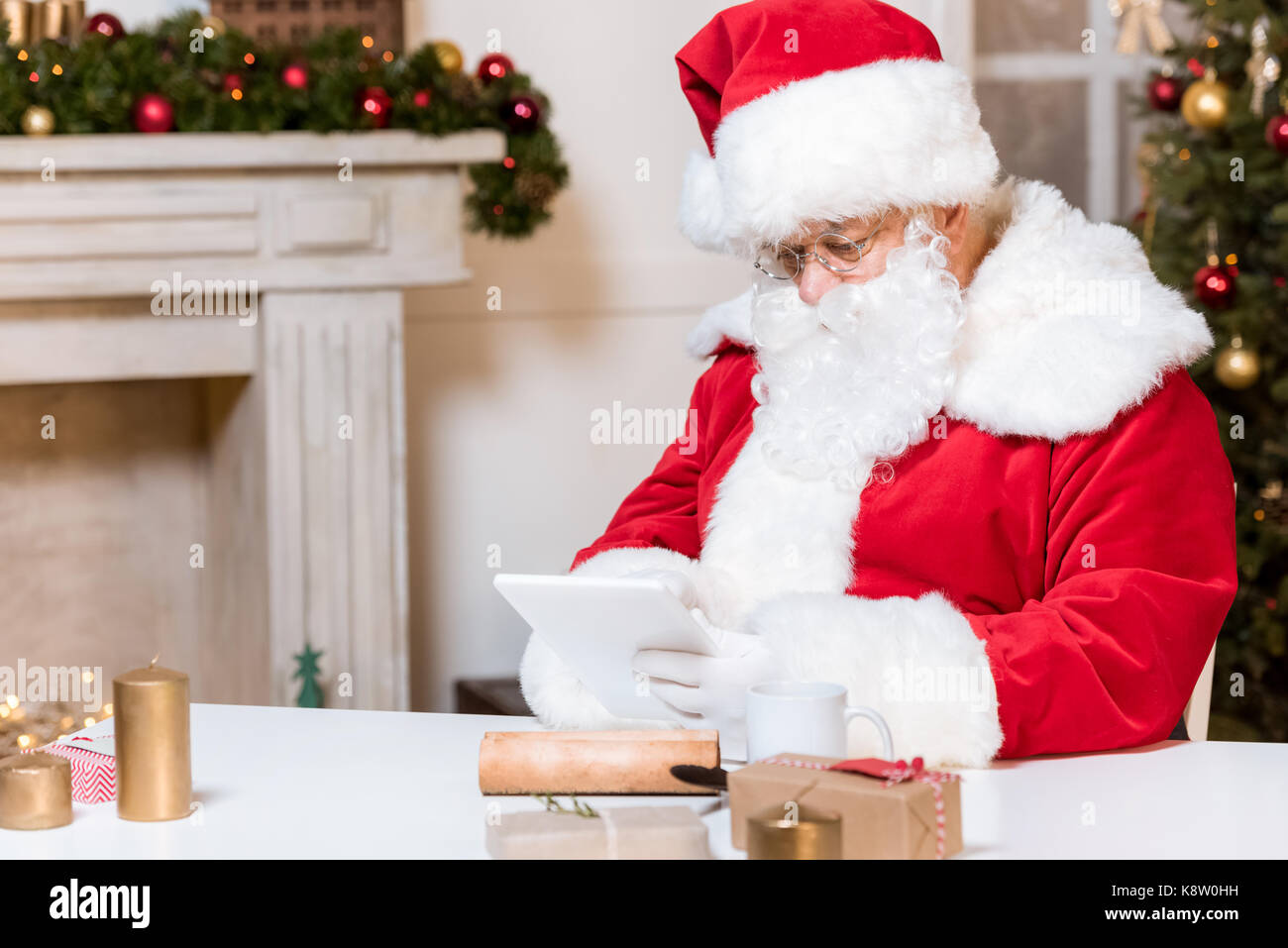 santa claus using tablet Stock Photo - Alamy