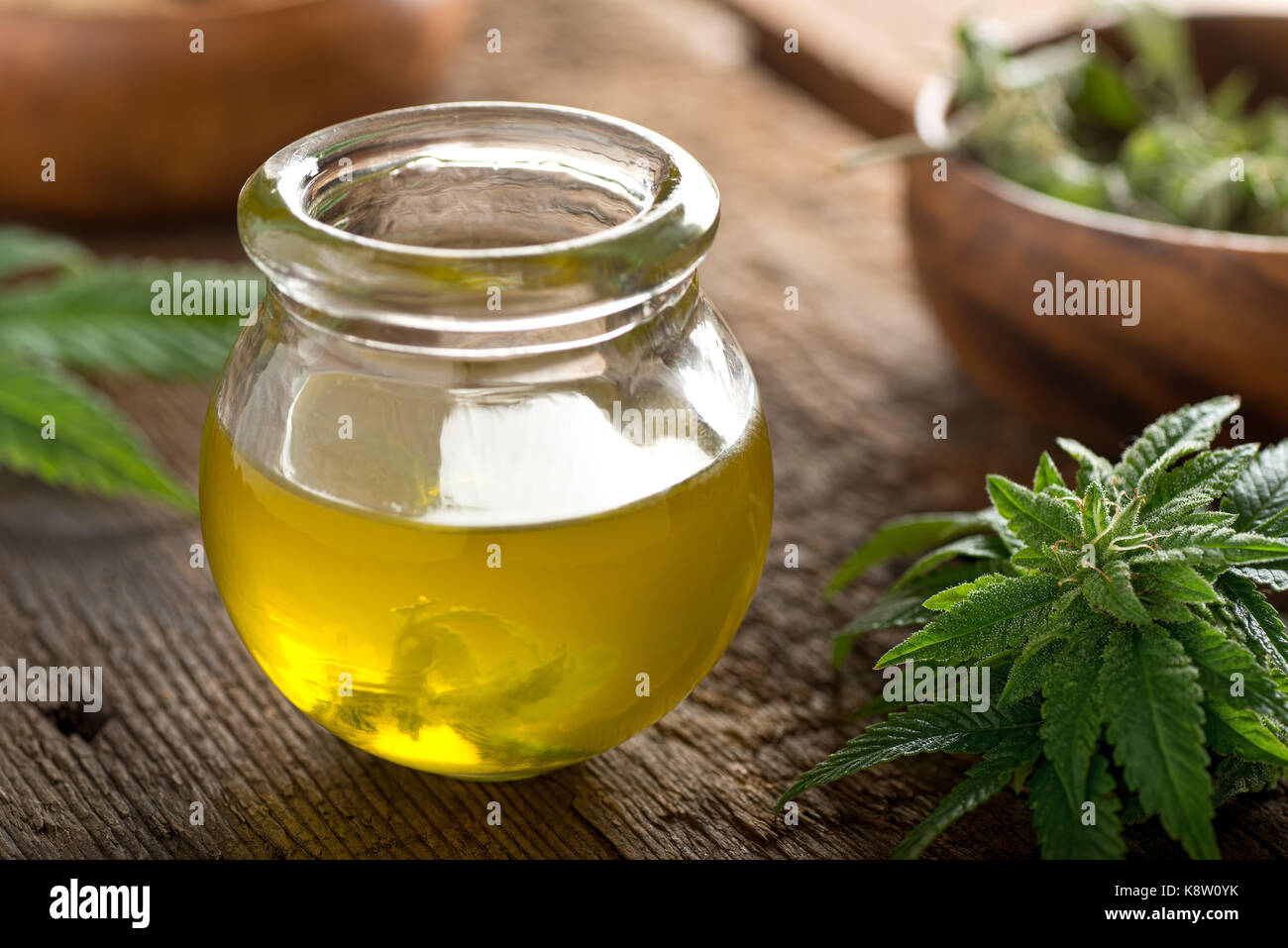 Delicious homemade cannabis oil with marijuana buds and leaf Stock ...