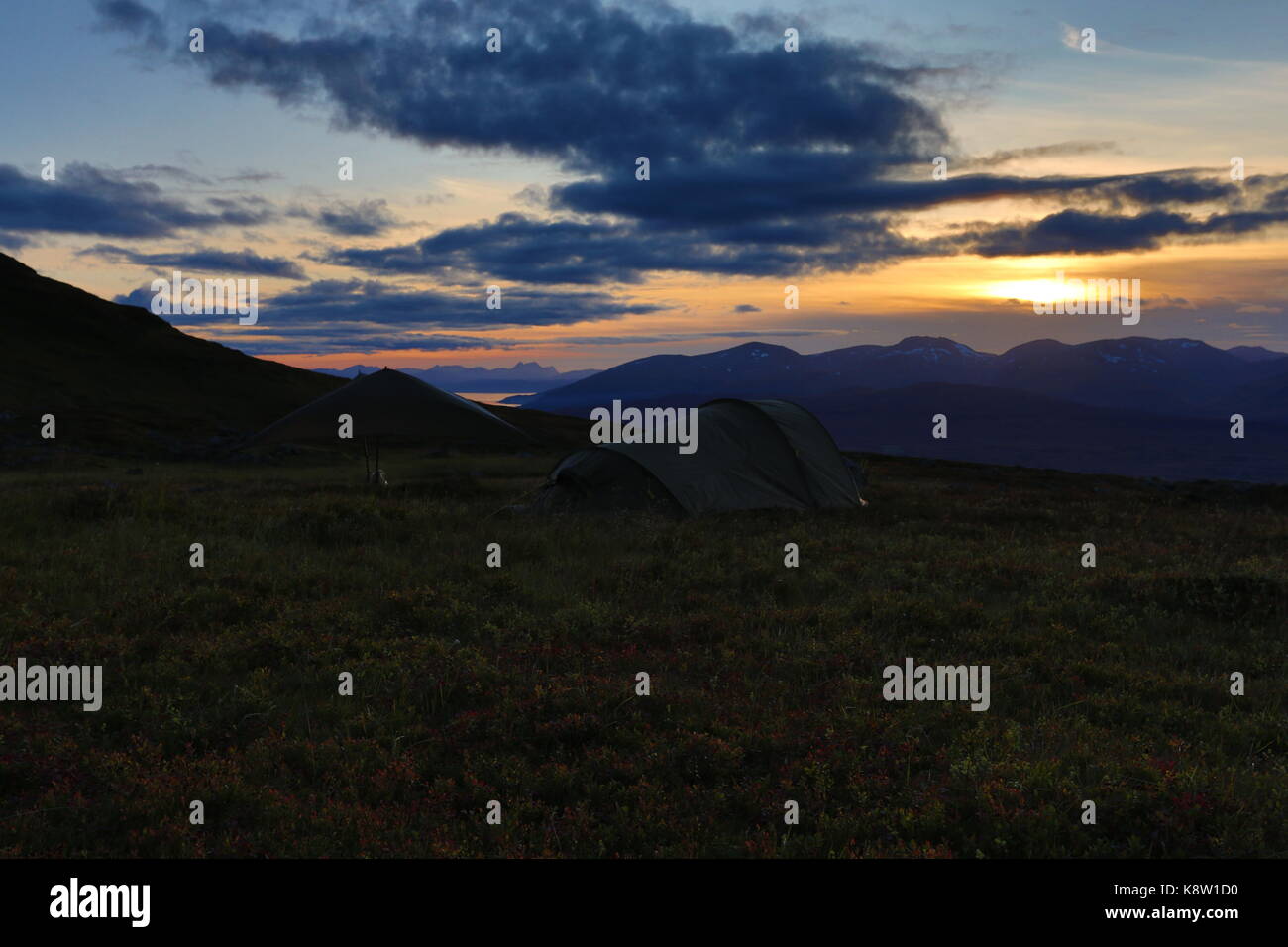 Tent In Mountain Sunset Stock Photo - Alamy
