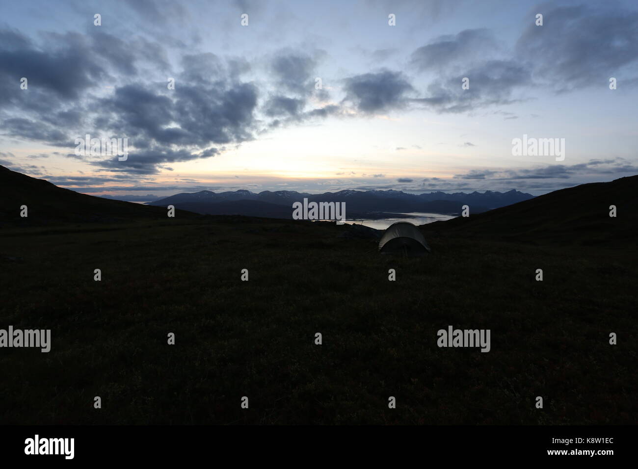 Tent In Mountain Sunset Stock Photo - Alamy