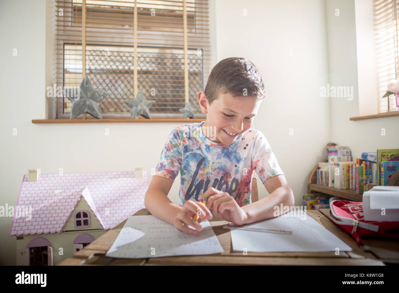 Boy studying maths homework hi-res stock photography and images - Alamy