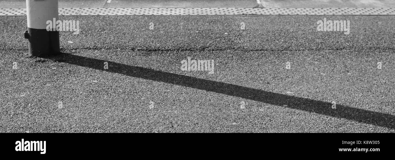 Lamp post shadow Stock Photo - Alamy