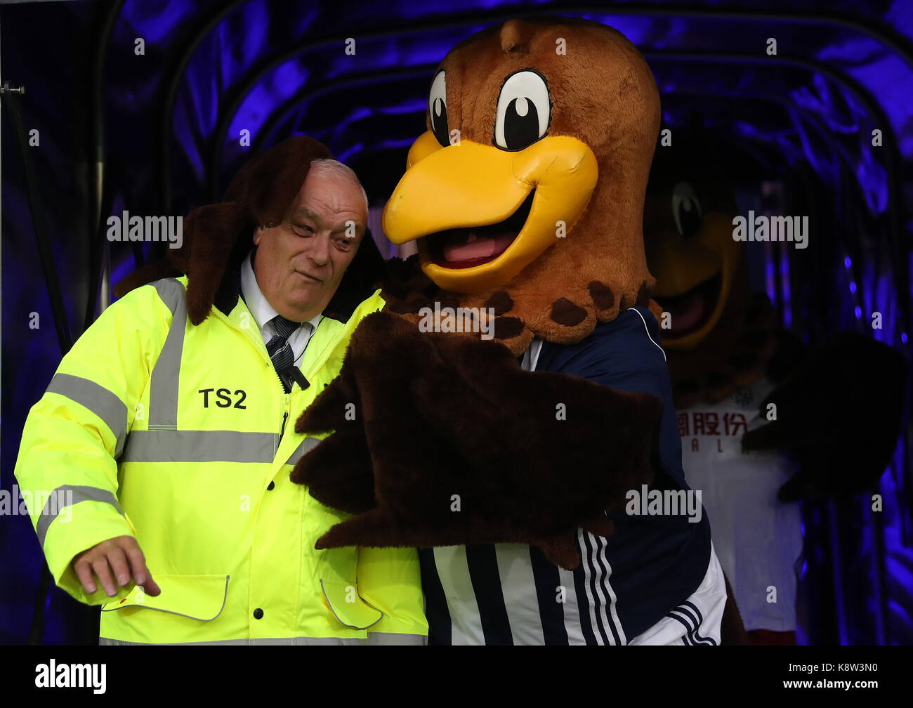 The West Brom mascot with a member of the security staff before the ...