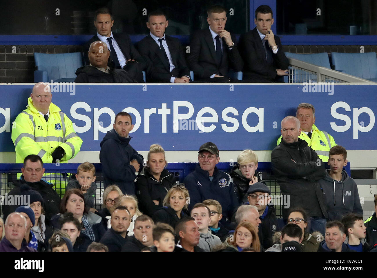 Everton's Wayne Rooney (centre) in the stands during the Carabao Cup ...