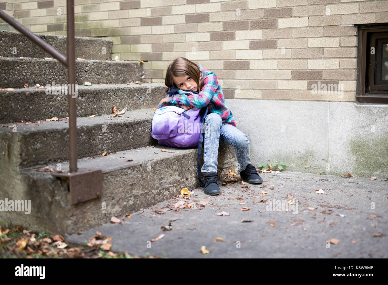 primary student depress at the school Stock Photo - Alamy
