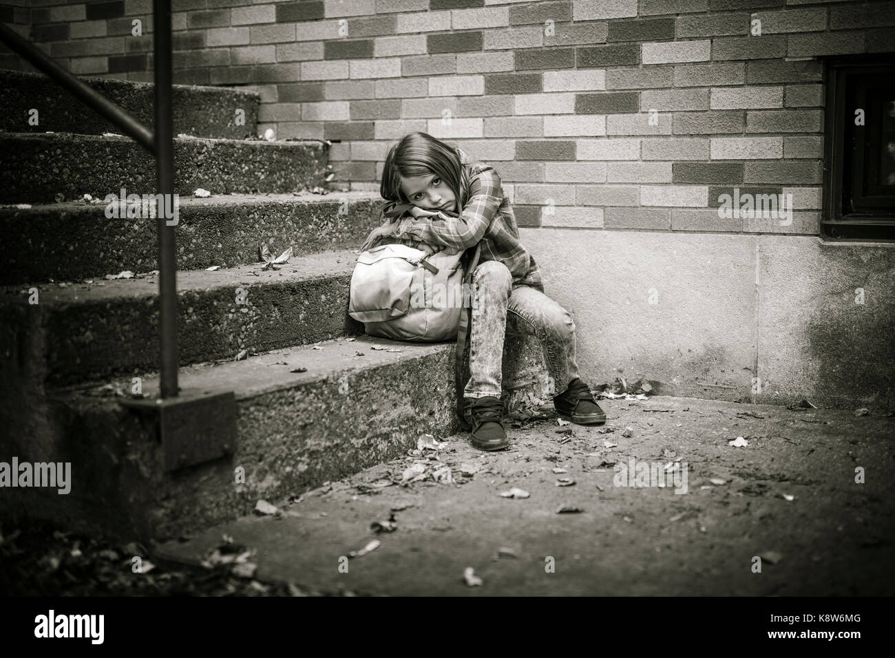 primary student depress at the school Stock Photo - Alamy