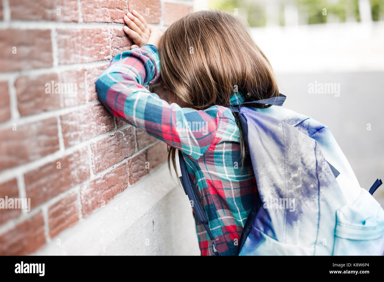 primary student depress at the school Stock Photo - Alamy