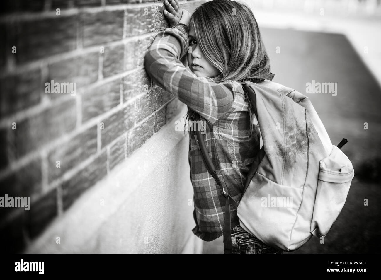 primary student depress at the school Stock Photo - Alamy