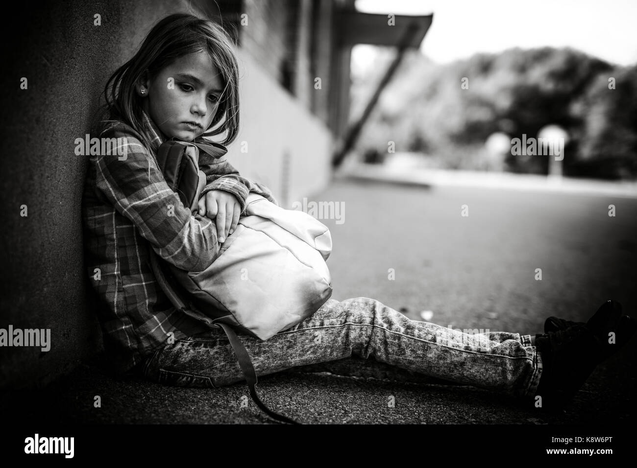 primary student depress at the school Stock Photo - Alamy