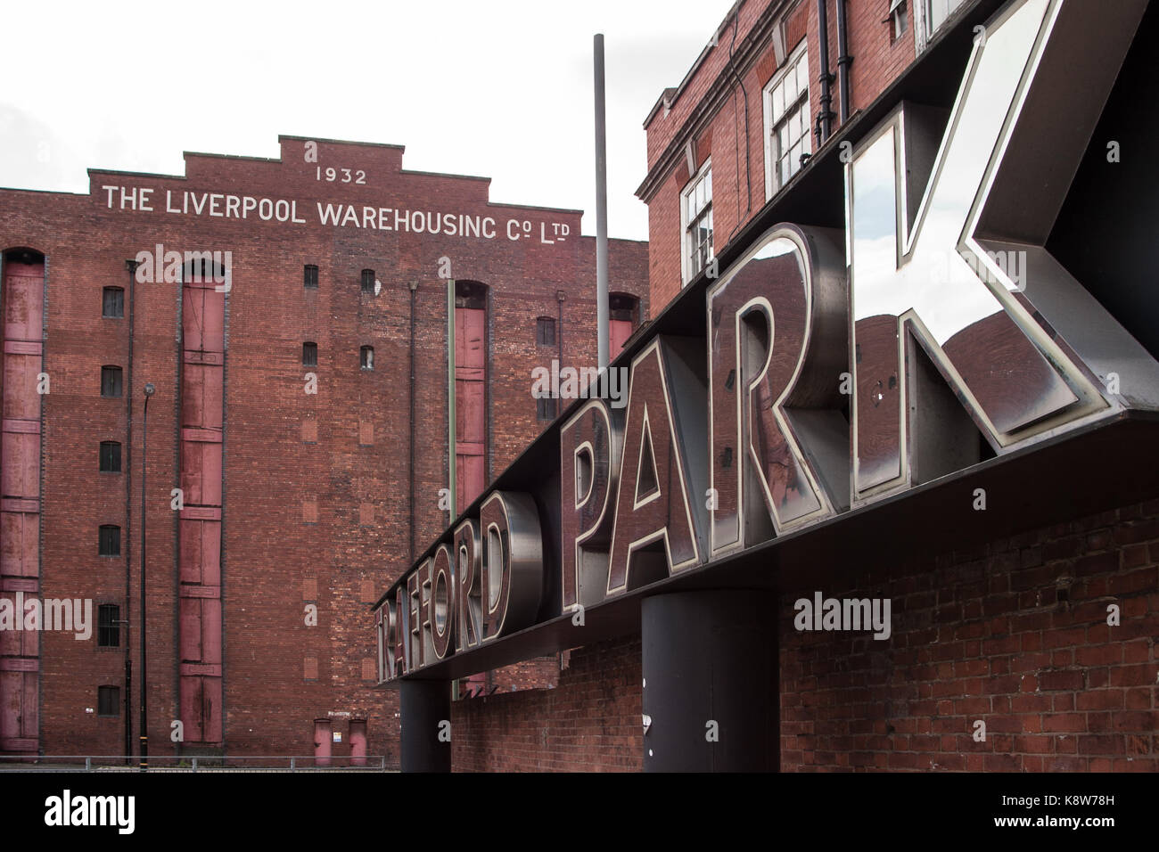 Trafford Park sign and the Liverpool Warehousing Company warehouse in ...
