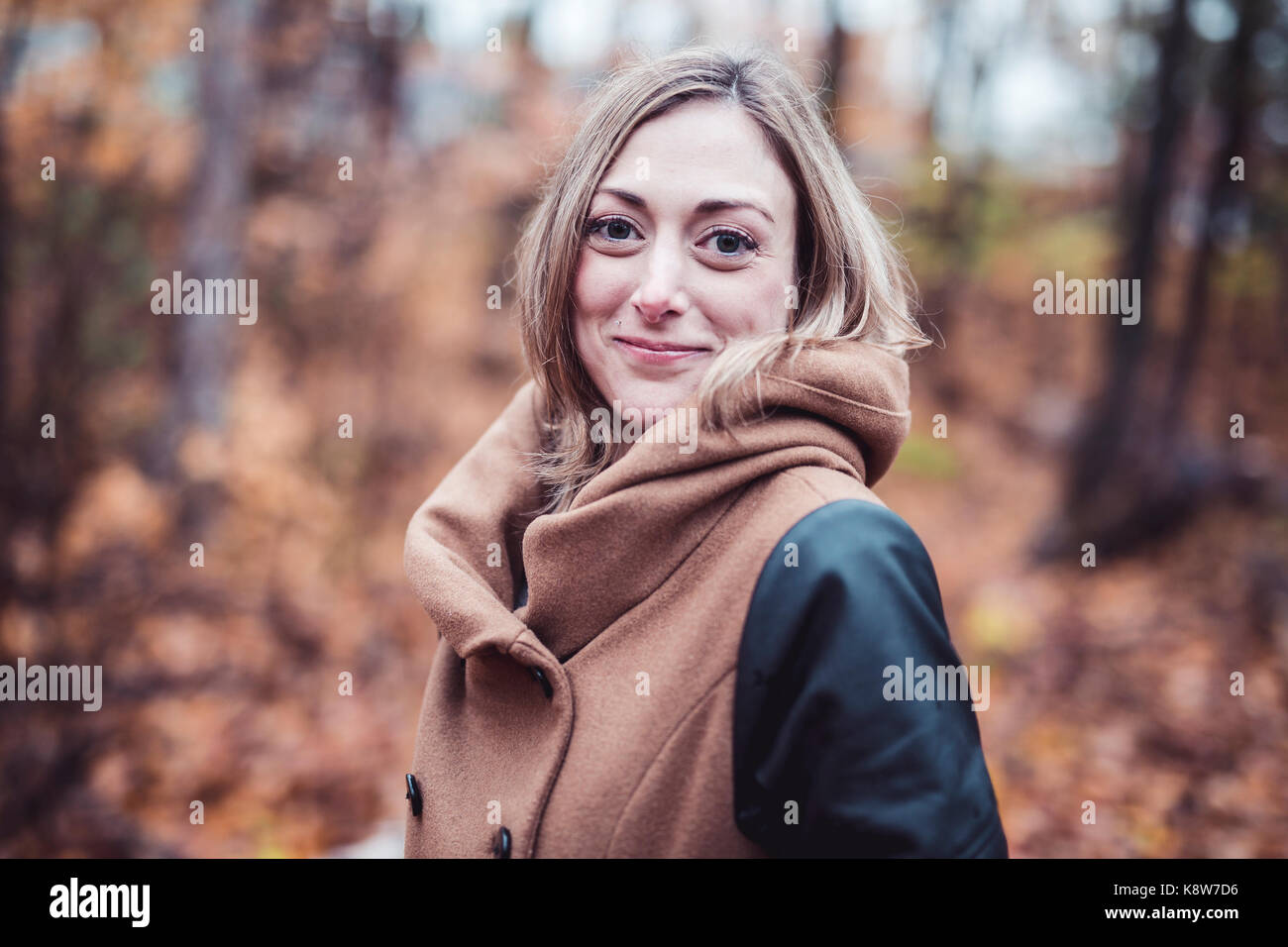 woman walking through the countryside in autumn time Stock Photo - Alamy