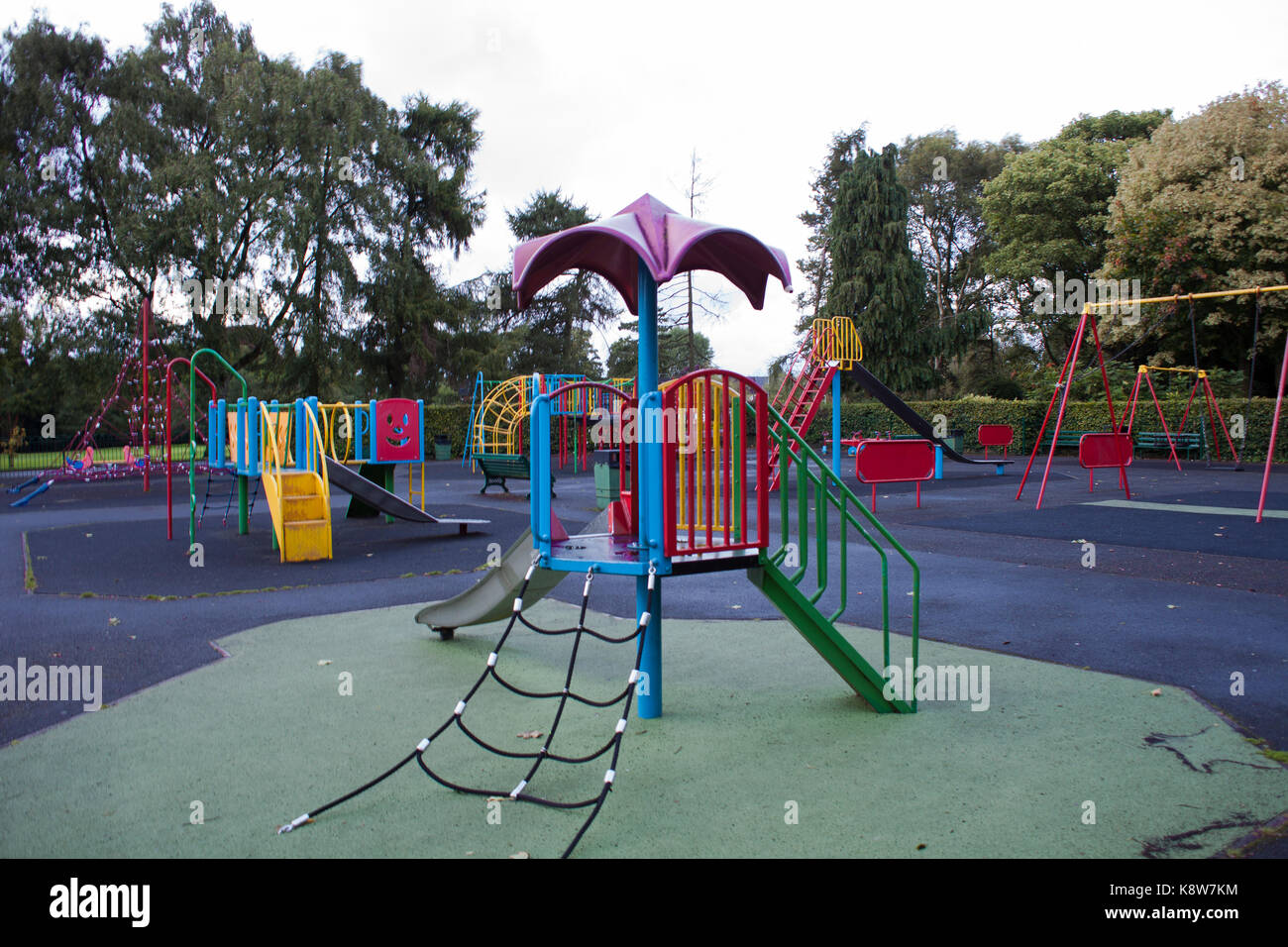 An empty Colourful children playground in the middle of the park Stock ...