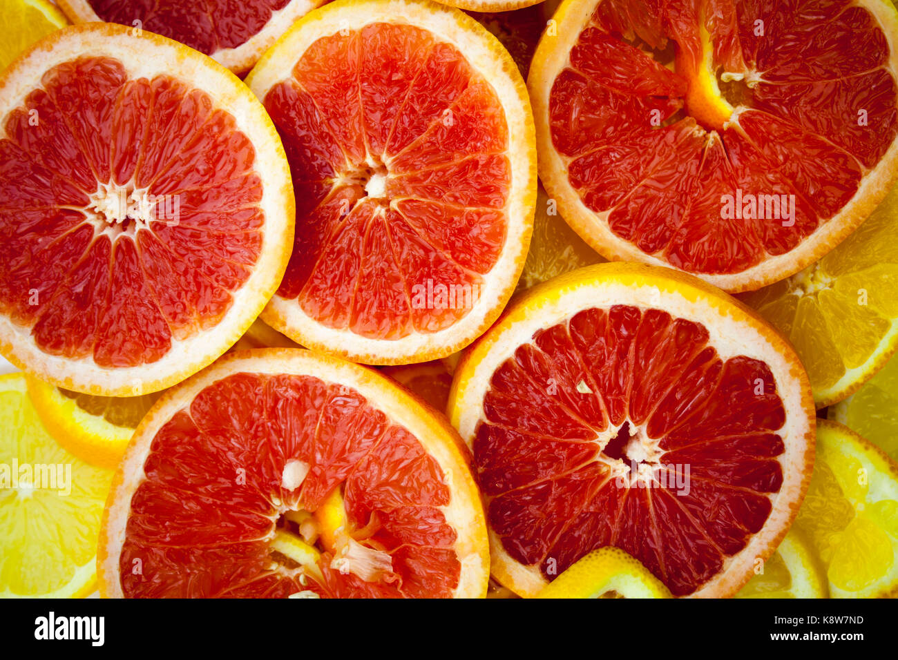 Grapefruit slices background texture Stock Photo - Alamy