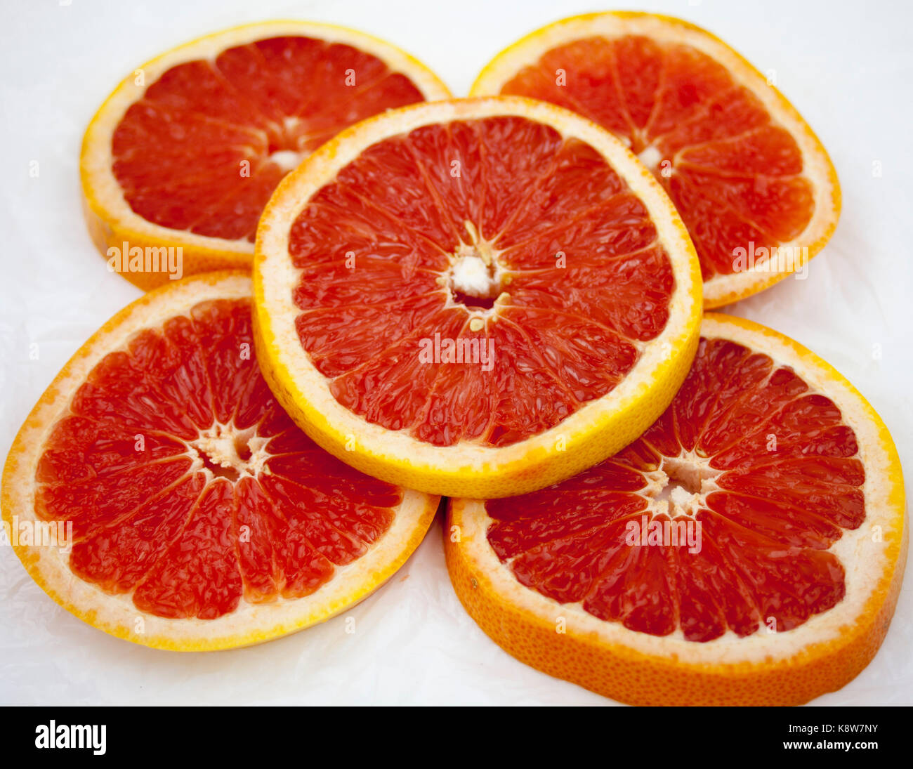 Grapefruit slices background texture Stock Photo - Alamy
