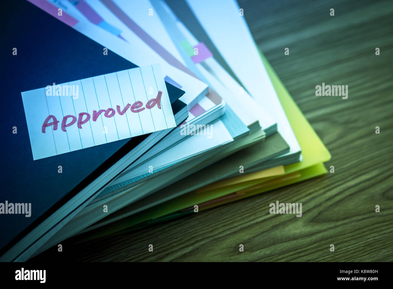 Approved; The Pile of Business Documents on the Desk Stock Photo - Alamy