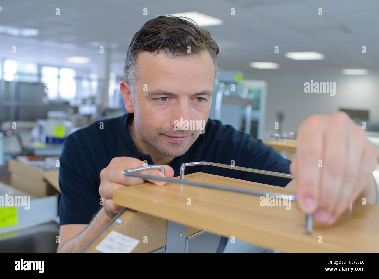 Setting up office hi-res stock photography and images - Alamy
