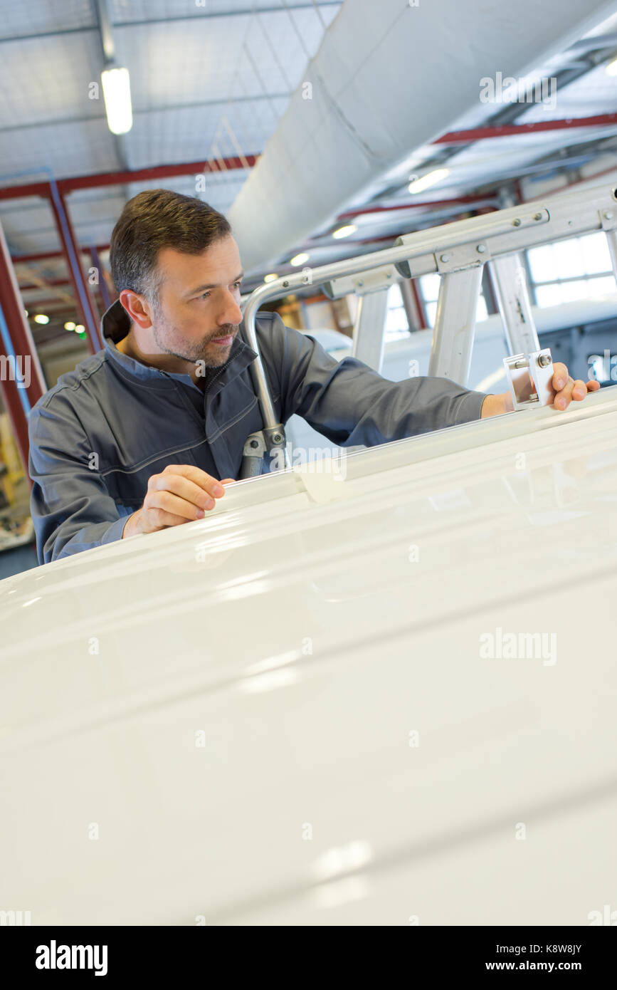 man working in a factory Stock Photo - Alamy