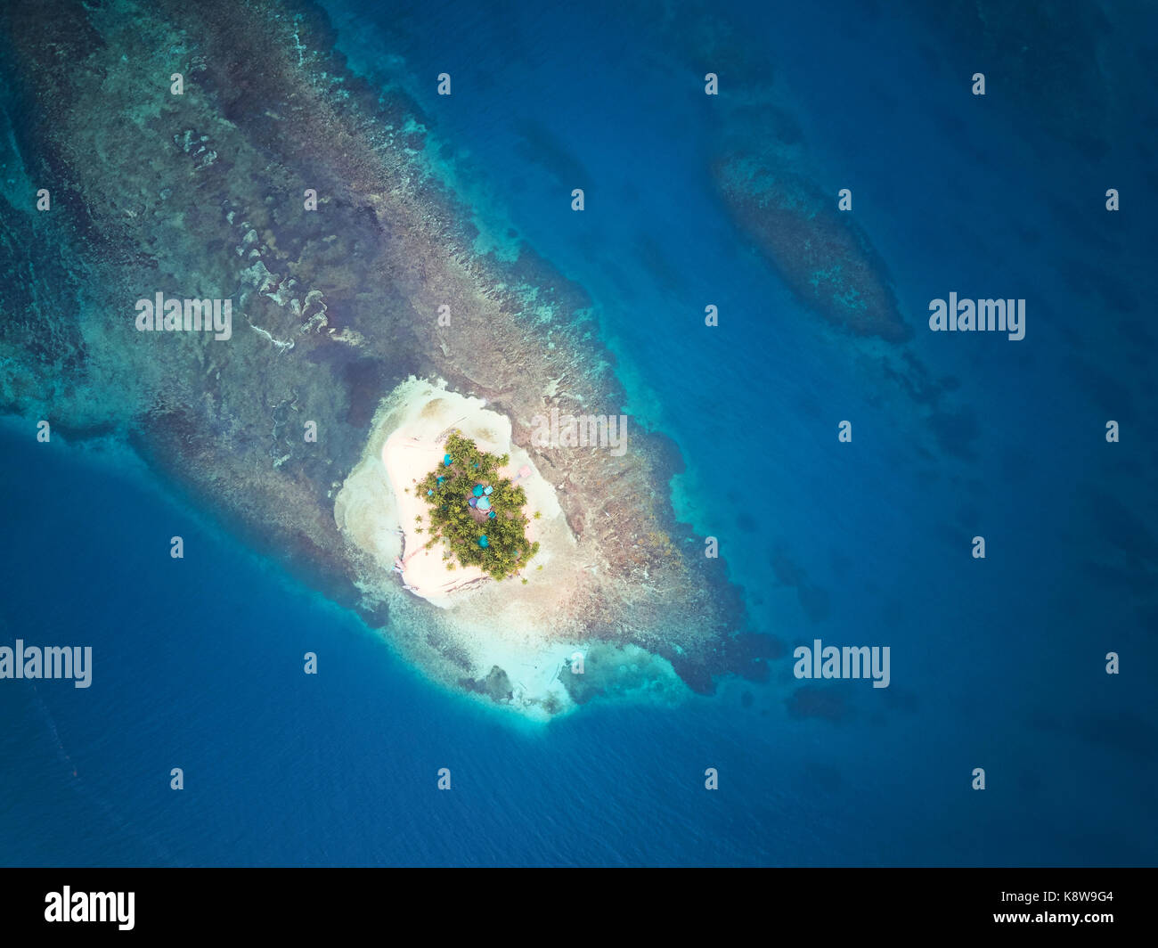 Small tropical island above top view Stock Photo - Alamy