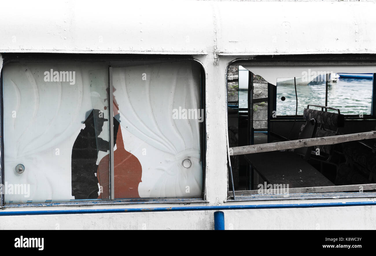Window art in a disused river boat restaurant Stock Photo - Alamy