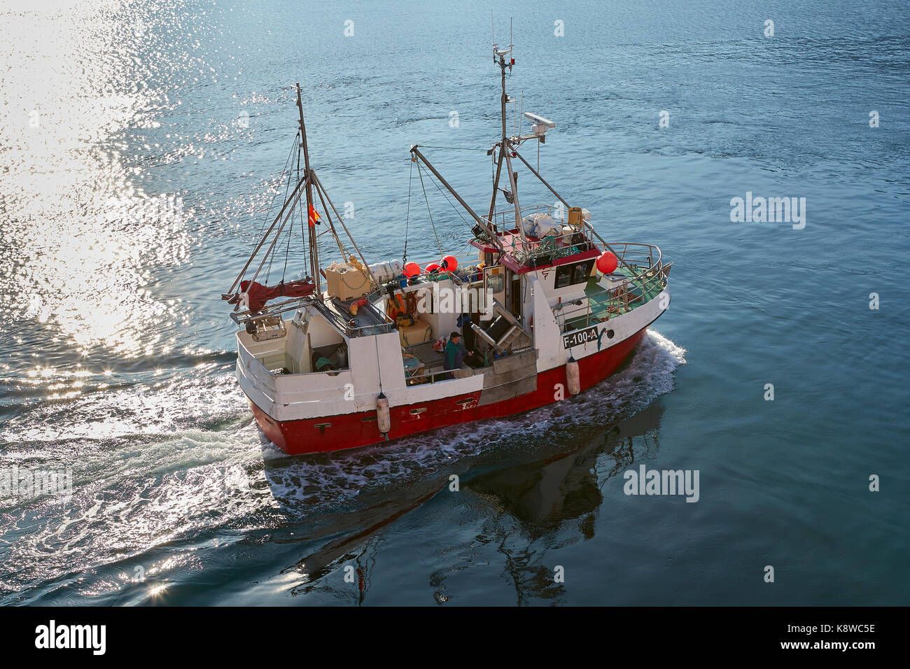 Small Norwegian Commercial Fishing Boat Under Way In Øksfjorden, Norway ...