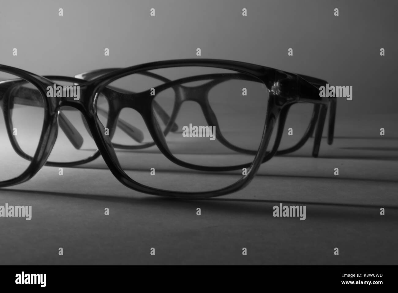 Rimmed eyeglasses closeup on a white background abstract view Stock ...