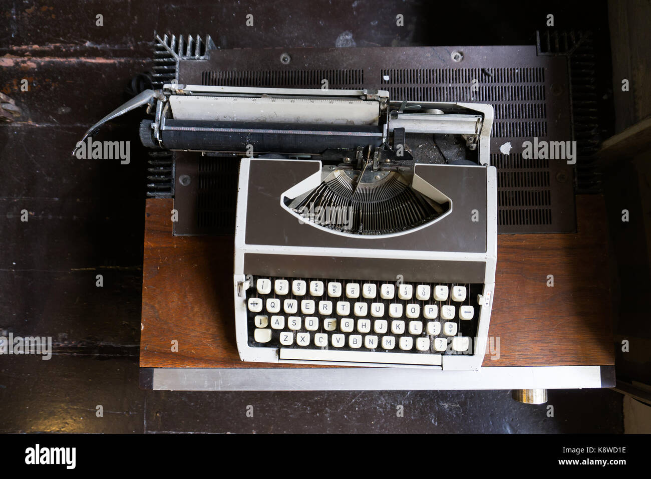 Vintage typewriter on a vintage desk with natural light Stock Photo - Alamy