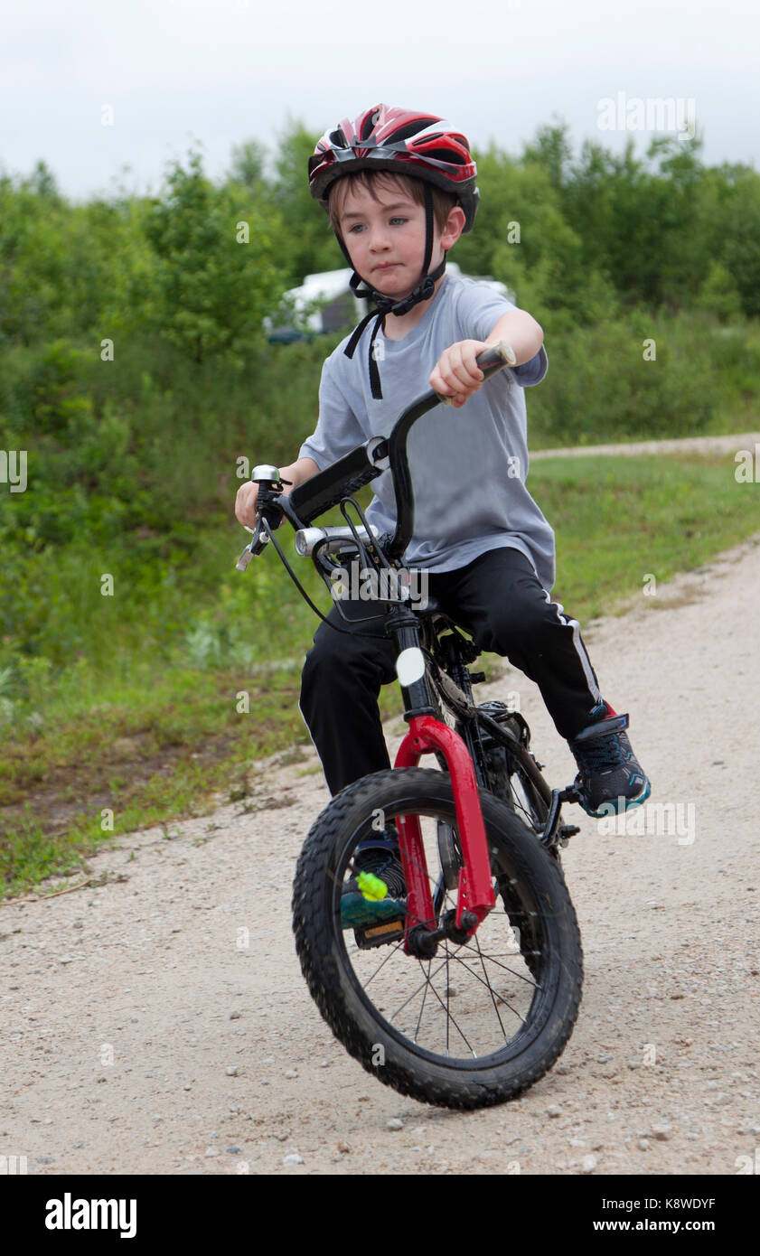 young child rides his bicycle Stock Photo - Alamy
